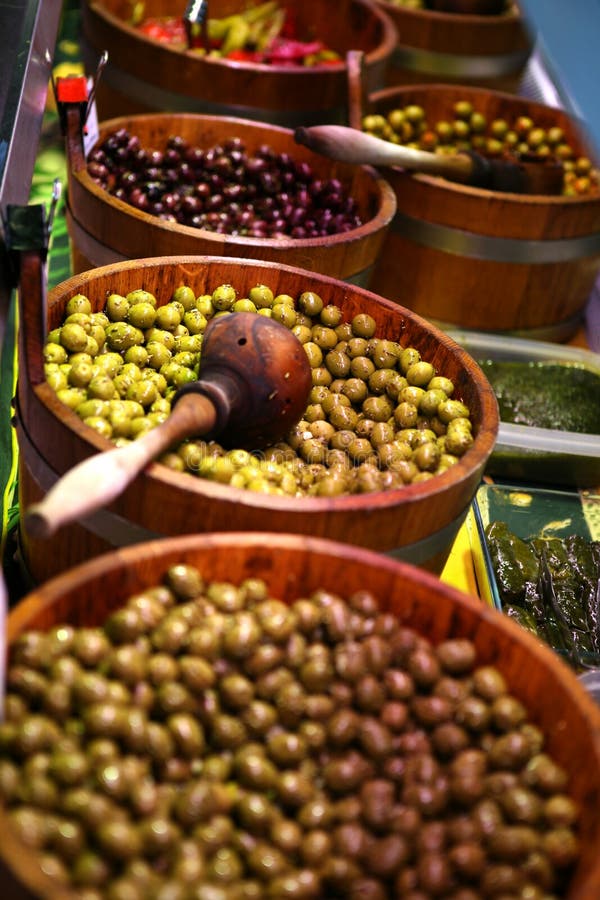 Pickled olives stock image. Image of brwon, olives, dipper - 18289797
