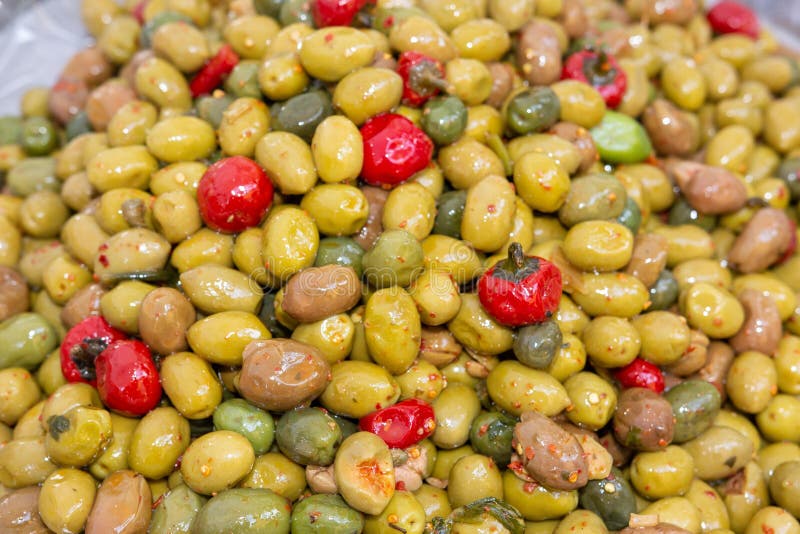 Pickled Olives with Capsicum Pepper and Oil Stock Image - Image of ...