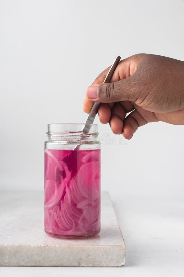 Pickled Onions on a Fork Being Held by Female Hand Stock Image - Image ...