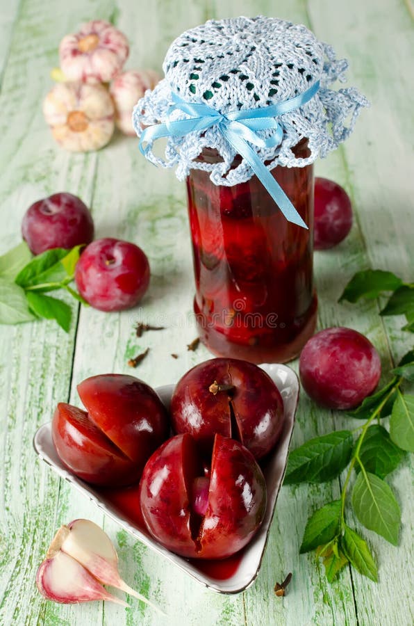 Pickled plum with garlic stock image. Image of bowl, bottle - 74255603
