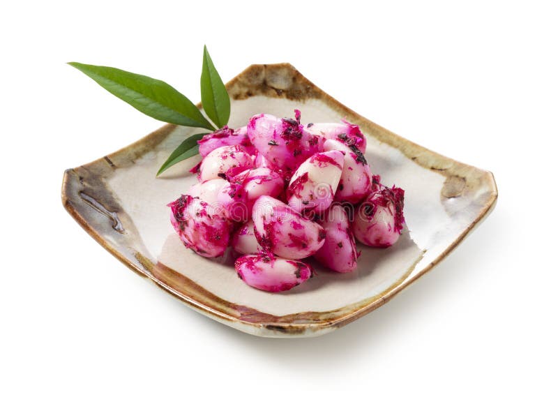 Pickled Shiso Garlic Served on a Plate Set Against a White Background ...