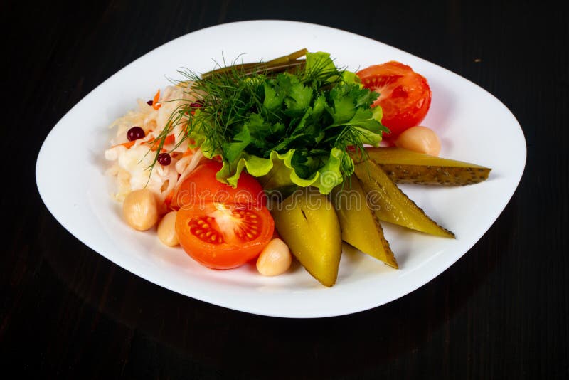 Pickled vegetables plate stock photo. Image of preserves - 129813392