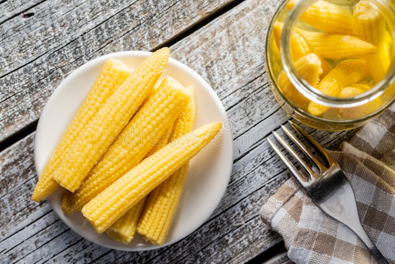 Pickled Young Baby Corn Cobs on Plate Stock Photo - Image of diet ...