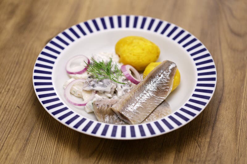 Pickled Young Herring Fillet ( Matjes ) with Boiled Potato Stock Photo ...