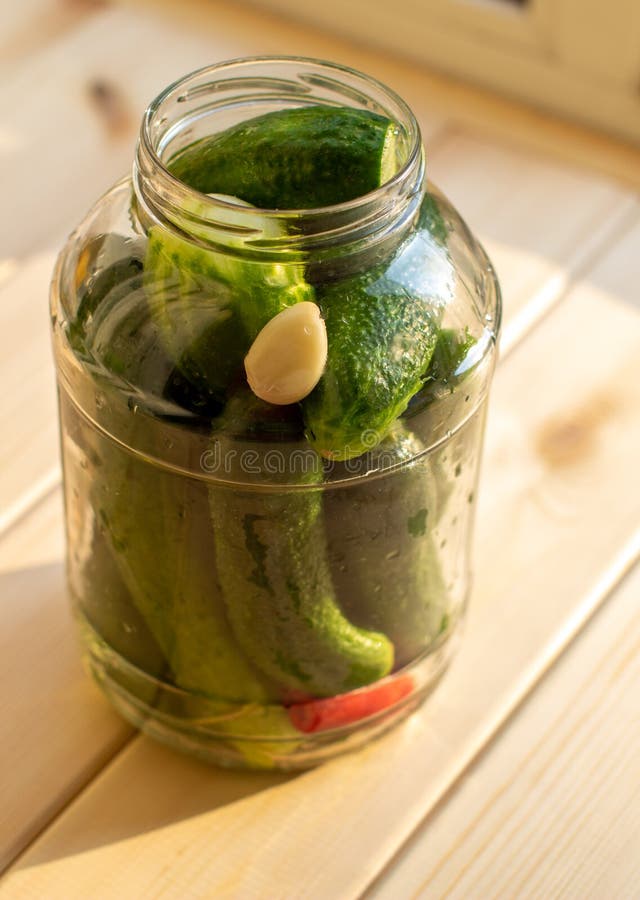 Pickling Jars with Cucumbers in the Process. Pickles for the Winter ...