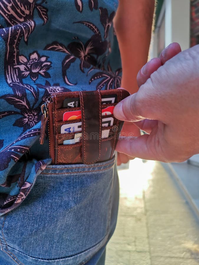 Pickpocketing, a Thief Trying To Stole a Wallet from a Back Pocket ...