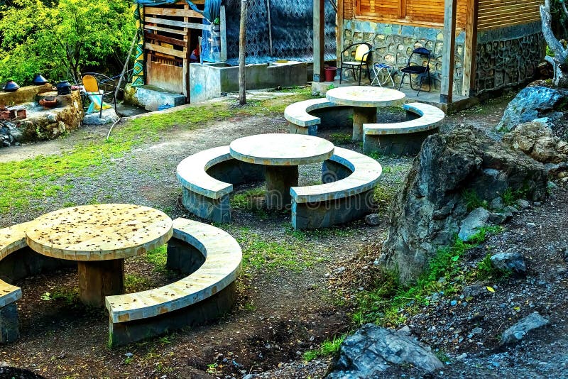 Picnic Area with a Table and a Bench in the Forest by the River Stock ...