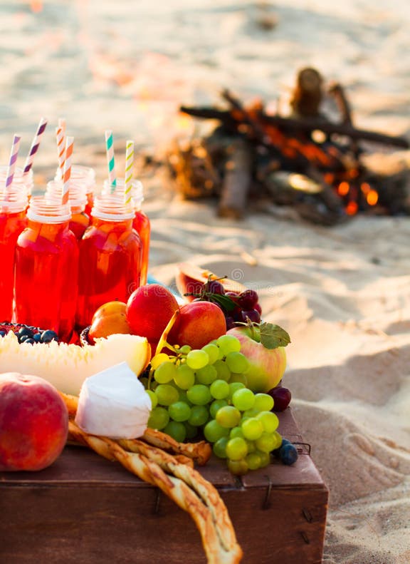 Picnic on the Beach at Sunset in the Boho Style Stock Photo - Image of ...