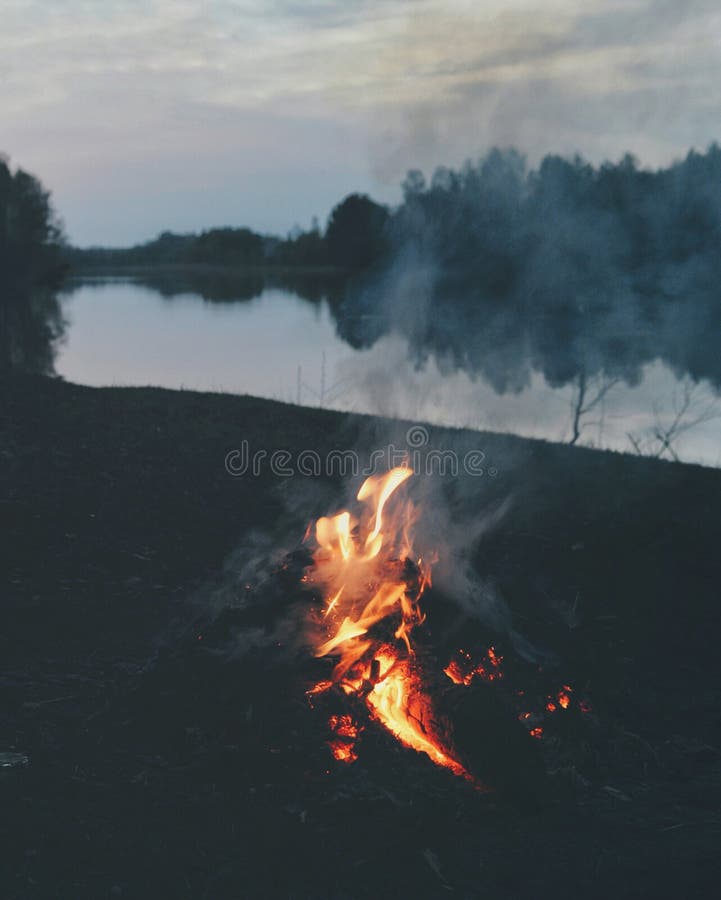 Picnic fire near the river stock photo. Image of dark - 145741882
