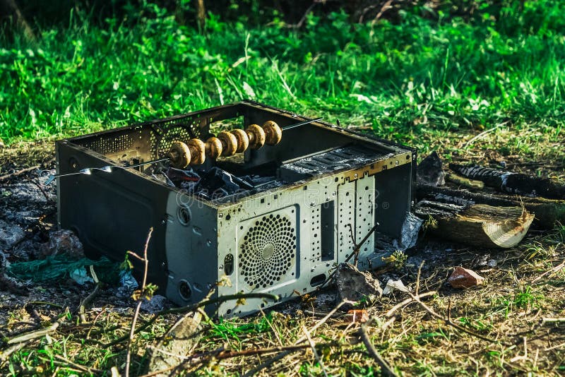 A Picnic with a Fire and a Grill in the Old Computer Case Stock Image ...