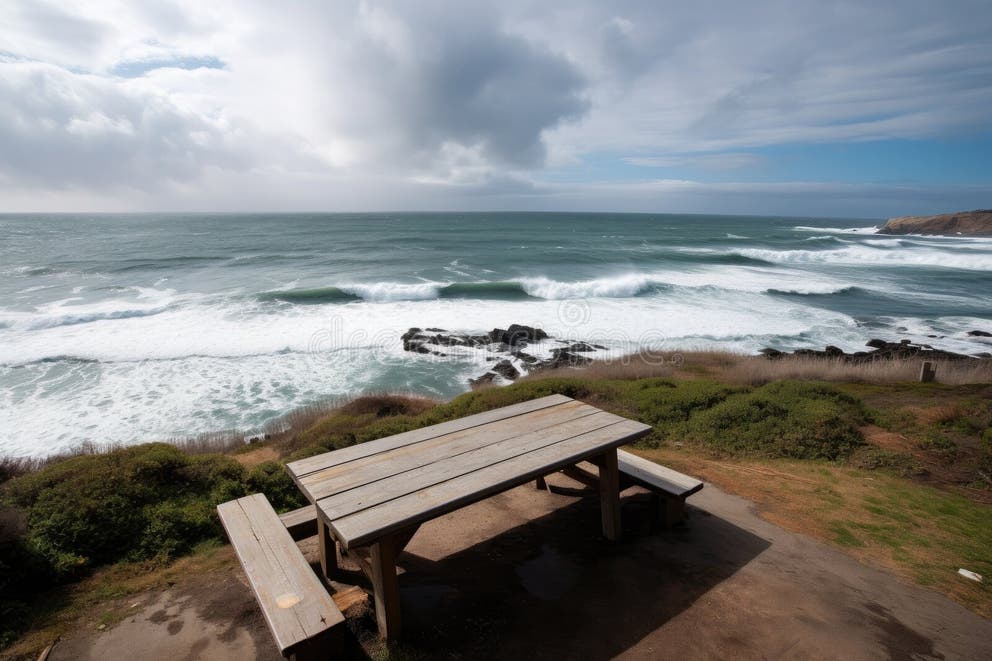 Picnic Table with a View of the Ocean, Waves Rolling in Stock ...