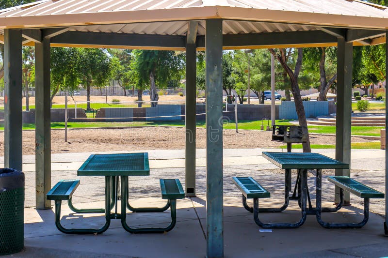 Picnic Tables with Benches at Local Park Stock Image - Image of cars ...