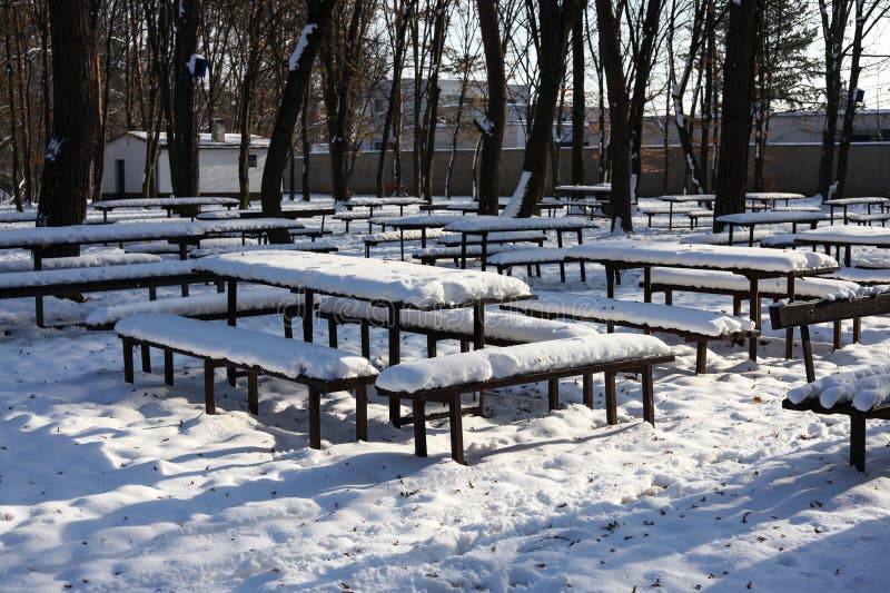 Picnic Tables in the Park Covered in Snow Stock Image - Image of ...