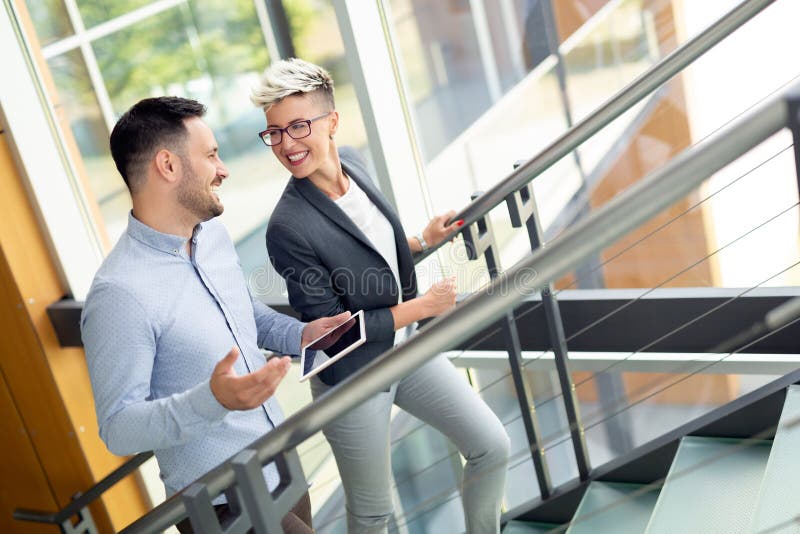 Picture of Architects Talking about Project in Hall Stock Image - Image ...