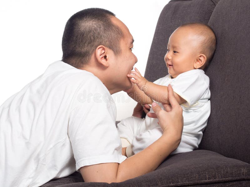 Baby touch daddy face stock photo. Image of emotion, cute - 30217748