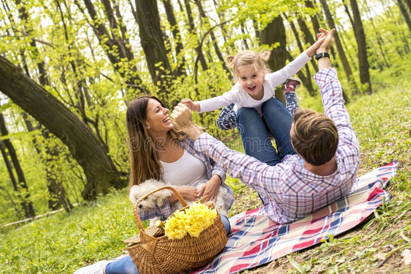 Picture of a Beautiful Family Having Fun at a Park Stock Image - Image ...