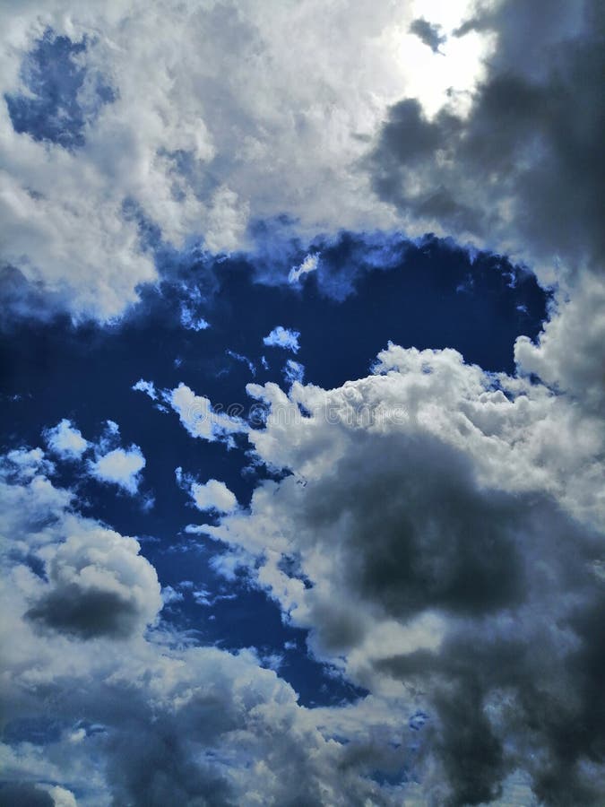 Blue cloudy sky in city stock image. Image of cloudy - 163786057