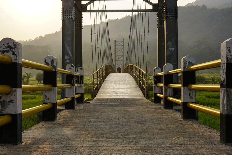 Picture of Bridge with Silhouette People in the Middle Stock Image ...