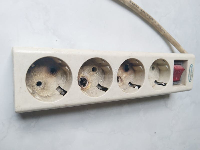 Burnt Four Hole Socket Outlet Stock Photos - Free & Royalty-Free Stock ...