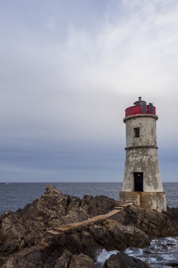Capo Ferro Lighthouse in Sardinia Stock Image - Image of rock, light ...