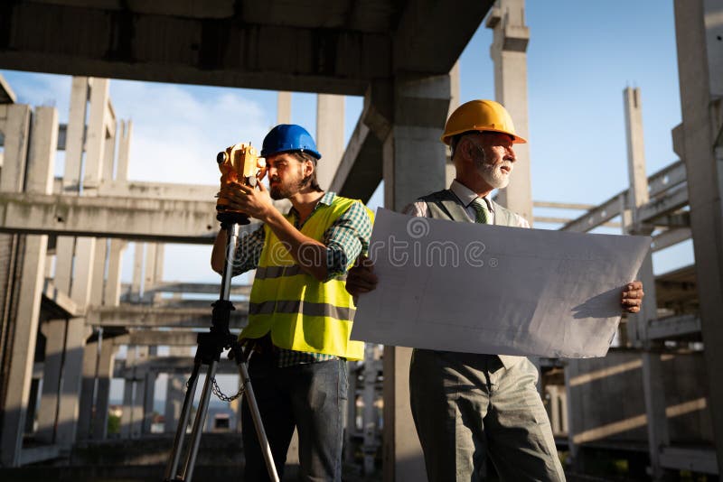 Picture of Construction Site Engineer Looking at Blueprint Stock Image ...