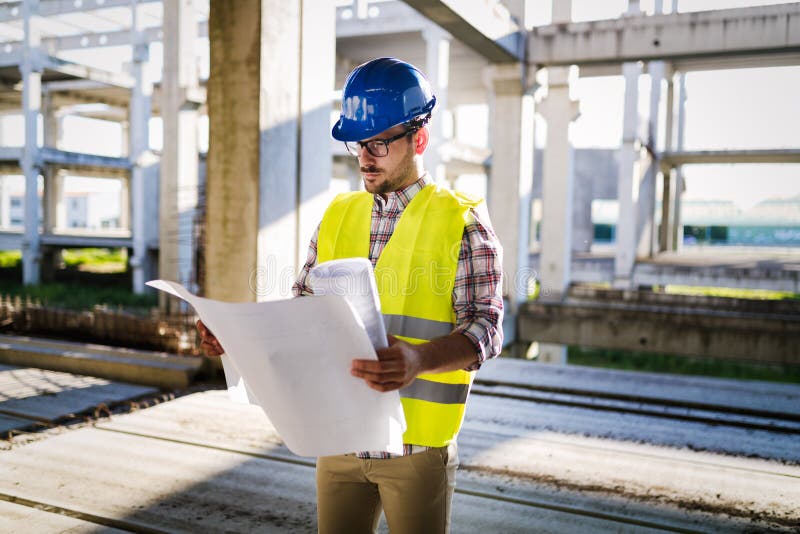 Picture of Construction Site Engineer Looking at Plan Stock Image ...