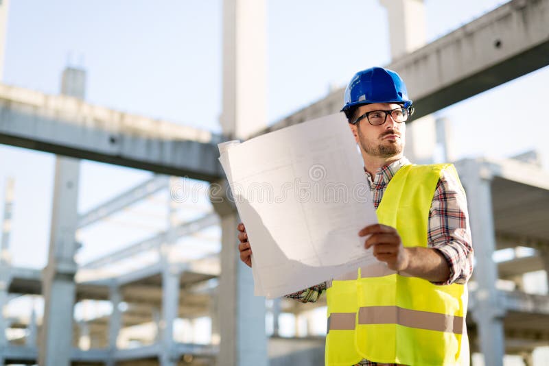 Picture of Construction Site Engineer Looking at Plan Stock Image ...