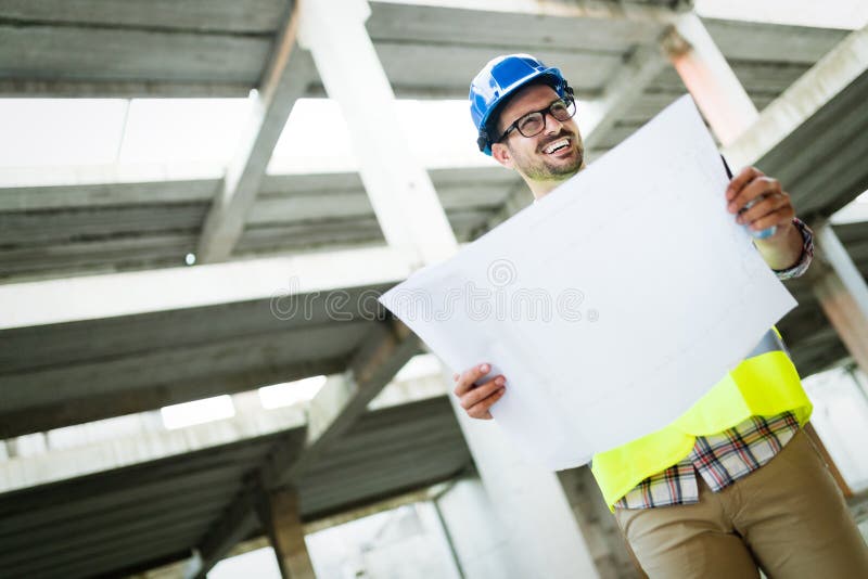 Picture of Construction Site Engineer Looking at Plan Stock Image ...