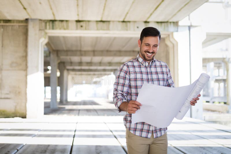 Picture of Construction Site Engineer Looking at Plan Stock Image ...