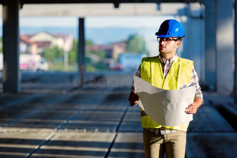 Picture of Construction Site Engineer Looking at Plan Stock Image ...