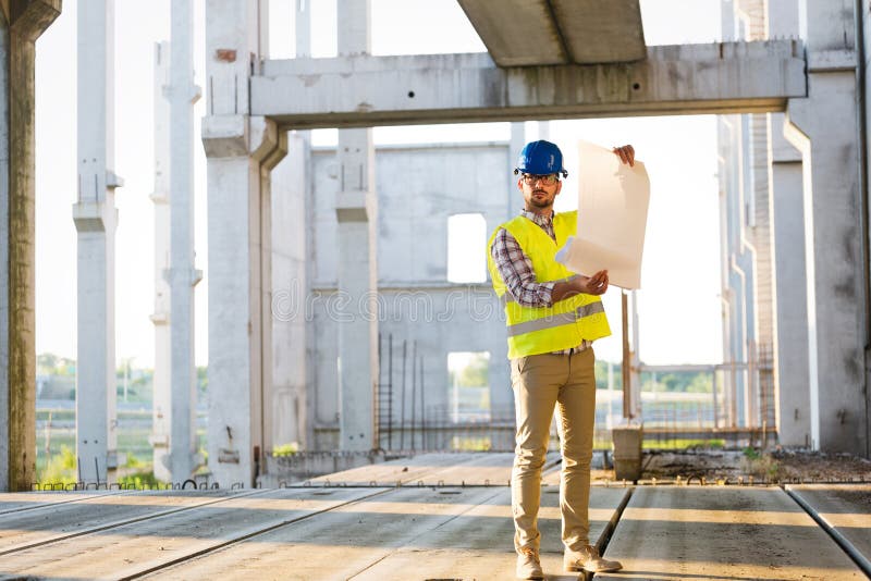 Picture of Construction Site Engineer Looking at Plan Stock Image ...