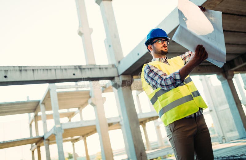 Picture of Construction Site Engineer Looking at Plan Stock Image ...