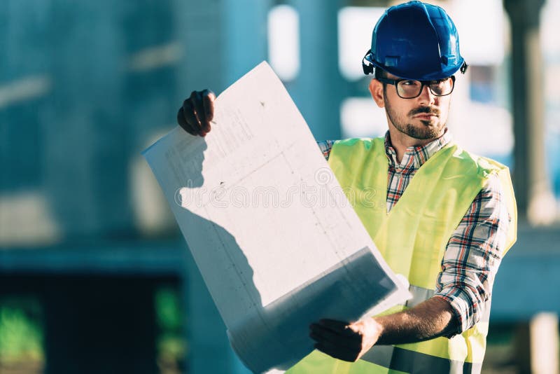 Picture of Construction Site Engineer Looking at Plan Stock Image ...