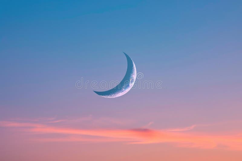 A Picture of a Crescent Moon Visible in the Sky during a Beautiful ...