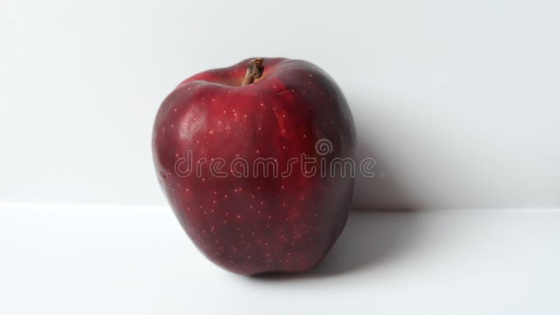 Dark red apple stock photo. Image of apple, white, dark - 129933026