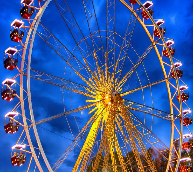 Carousel in the evening stock photo. Image of lights - 103889660