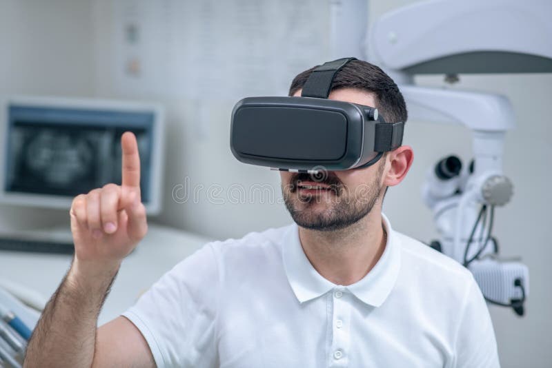 Picture of a Doctor in Vr Glasses Looking Involved Stock Photo - Image ...