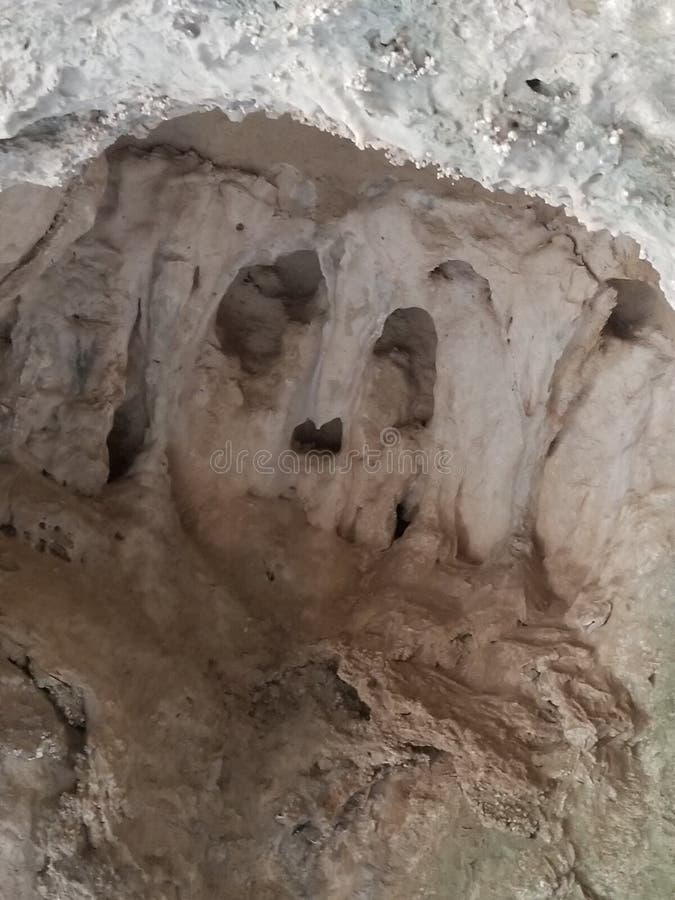 Picture of a Face Inside of a Cave Stock Photo - Image of face, rock ...