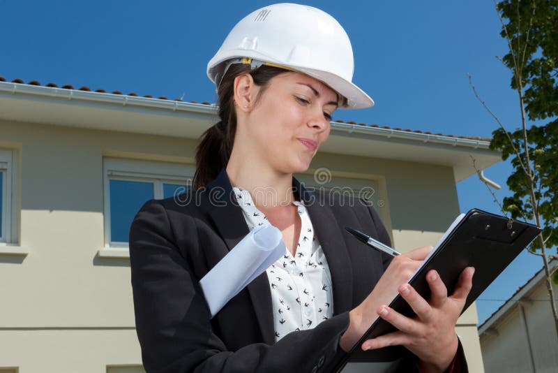 Picture Female Real Estate Inspector Stock Photo - Image of yellow ...