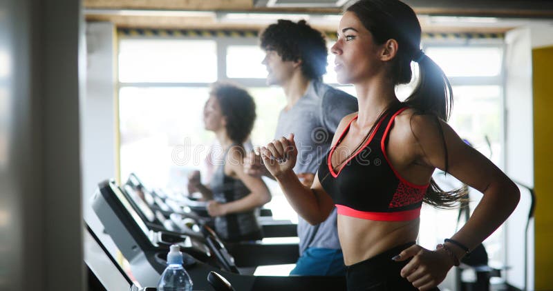 Picture of People Running on Treadmill in Gym Stock Photo - Image of ...