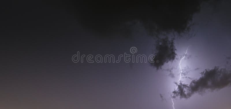 Picture of a Flash in the Night Sky with Glowing Clouds Stock Image ...