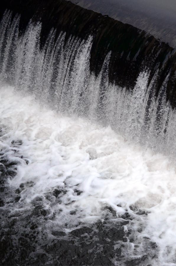 A Picture of the Flowing Water. the Dam is Designed To Regulate the ...