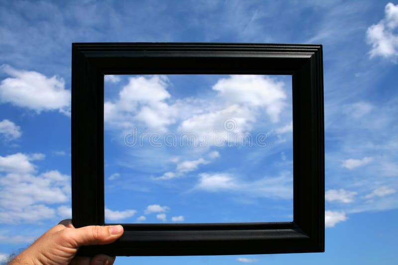 Picture Frame stock image. Image of hand, clouds, empty - 5886599