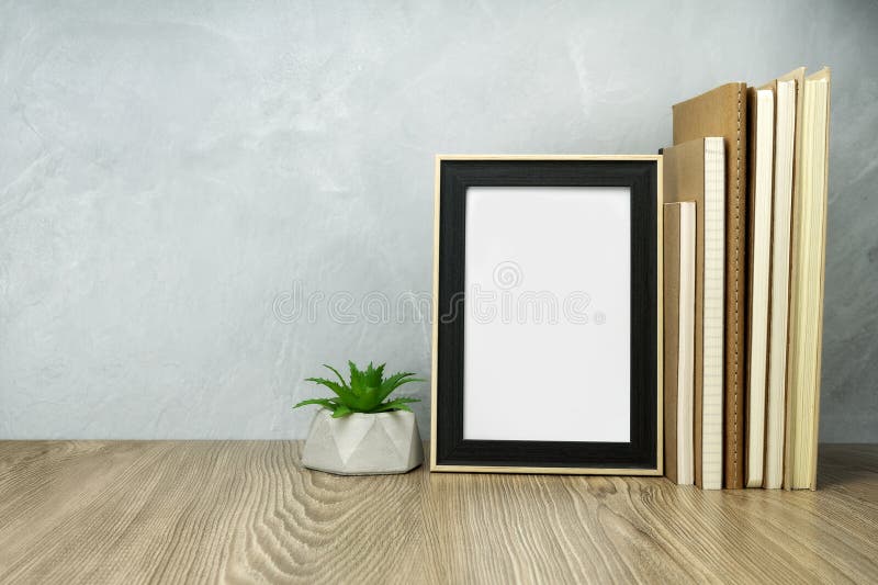 Picture Frame and Note Book on Table. Work Desk Space Stock Image ...