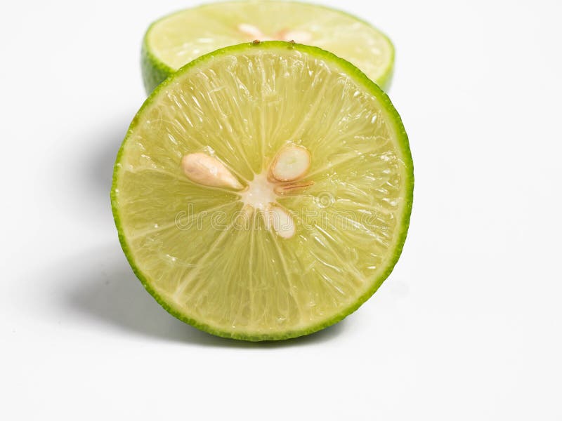 Picture of Green Citrus with Leafs on a White Isolated Background Stock ...