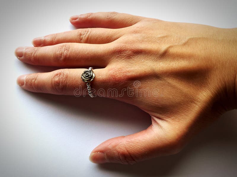 Womans Hand with Ring on Finger Stock Image - Image of finger, human ...