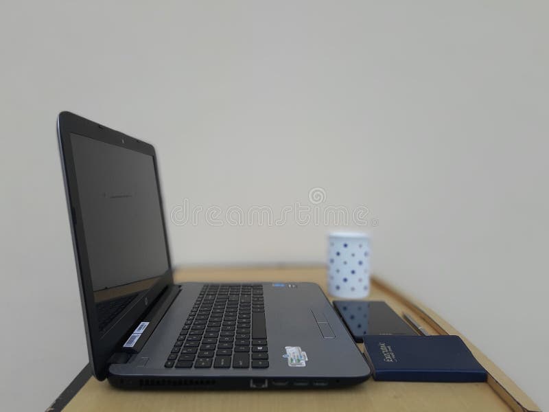 Picture of Laptop and Other Office Related Objects Kept on a Table ...