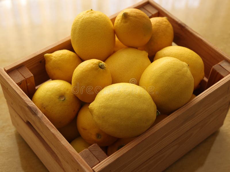 Lemons in a box stock image. Image of fruit, citric - 350234287