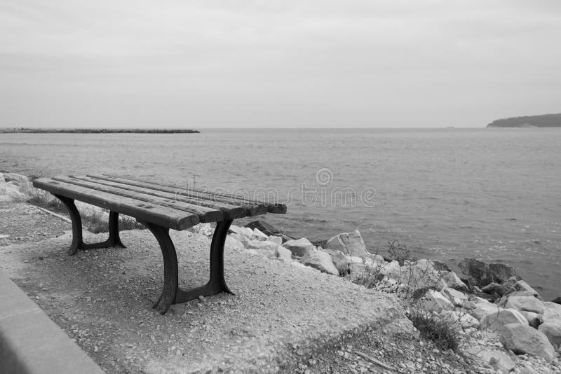 Lonely bench stock image. Image of water, seas, bench - 30039875