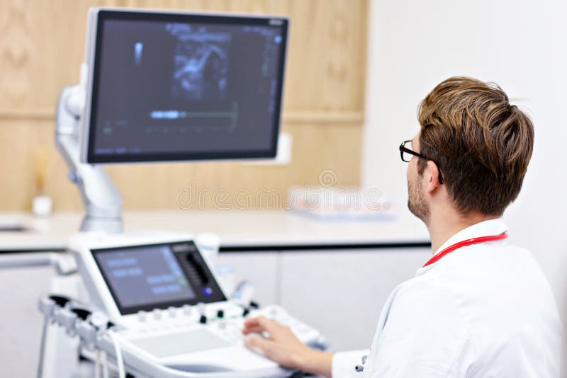 Doctor Using Ultrasound Machine Stock Photo - Image of play, hand ...